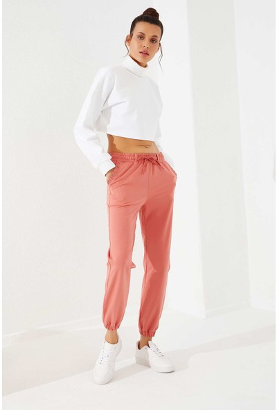 Tommy Life Cep Detaylı Pudra Lastikli Paça Kadın Eşofman Alt Tommy Life Cep Detaylı Pudra Lastikli Paça Kadın Eşofman Alt