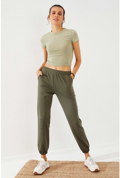 Tommy Life Mat Pres Baskılı Haki Lastikli Paça Kadın Eşofman Alt Tommy Life Mat Pres Baskılı Haki Lastikli Paça Kadın Eşofman Alt
