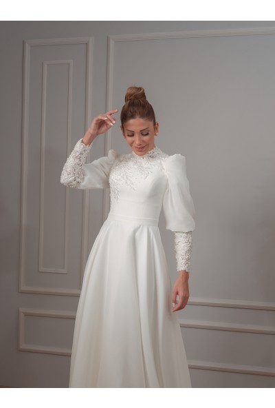 Madrigal Fildişi /taş Rengi Dantel Aplikeli Halter Yaka Tesettür Model Gelinlik Madrigal Fildişi /taş Rengi Dantel Aplikeli Halter Yaka Tesettür Model Gelinlik