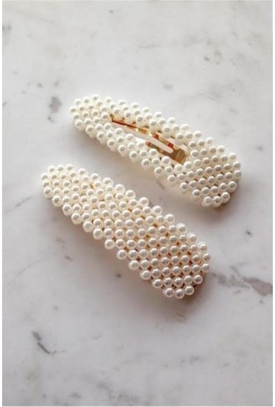 Artikel 2'li Incili Yan Toka