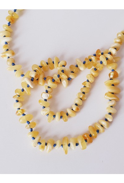 Kehribar Sarayı Damla Kehribar Süt Renk Çocuk Kolye Mavi Ip Tasarım 40 cm Sertifikalı Kehribar Sarayı Damla Kehribar Süt Renk Çocuk Kolye Mavi Ip Tasarım 40 cm Sertifikalı