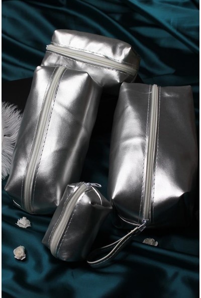 Mujgan 4'lü Makyaj Çantası Parlak Gümüş Renk Mujgan 4'lü Makyaj Çantası Parlak Gümüş Renk