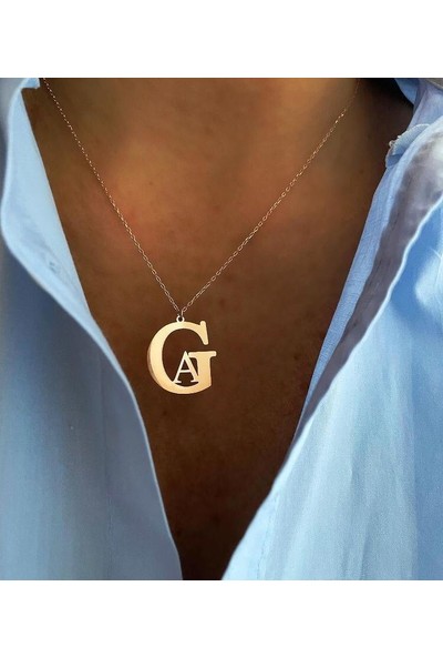 Mavili Tasarım Iç Içe Harf Gümüş Kolye Mavili Tasarım Iç Içe Harf Gümüş Kolye