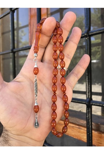 Şeffaf Turuncu Renk Beyzi Kesim Toz Kehribar Tesbih Şeffaf Turuncu Renk Beyzi Kesim Toz Kehribar Tesbih