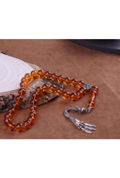 Burhan Sağlam Ateş Kehribarı Küre Kesim Gümüş Püsküllü Tesbih Burhan Sağlam Ateş Kehribarı Küre Kesim Gümüş Püsküllü Tesbih