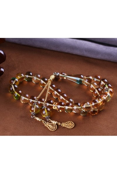 Burhan Sağlam Ateş Kehribarı Gümüş Püsküllü Tekerlek Kesim Tesbih Burhan Sağlam Ateş Kehribarı Gümüş Püsküllü Tekerlek Kesim Tesbih