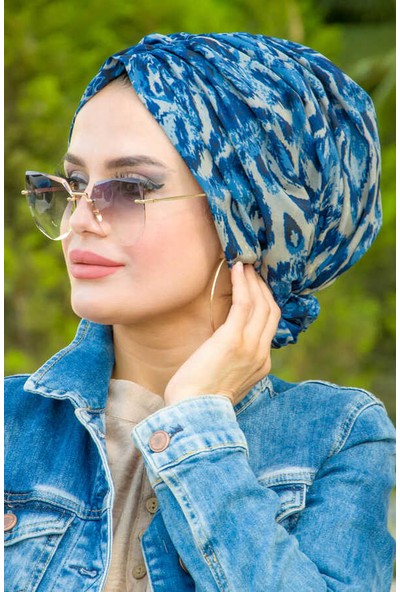 Aişe Tesettür Mavi Leopar Desen Tokalı Bone Aişe Tesettür Mavi Leopar Desen Tokalı Bone