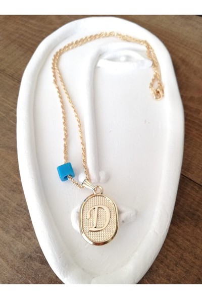 Kuzey Işıkları Kadın Gold Oval Plaka D Harfi Mavi Boncuklu Burgu Kolye