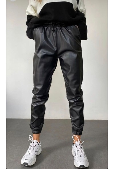 Ohepmoda Paçası ve Beli Lastikli Içi Şardonlu Kadın Deri Jogger Pantolon Siyah Ohepmoda Paçası ve Beli Lastikli Içi Şardonlu Kadın Deri Jogger Pantolon Siyah