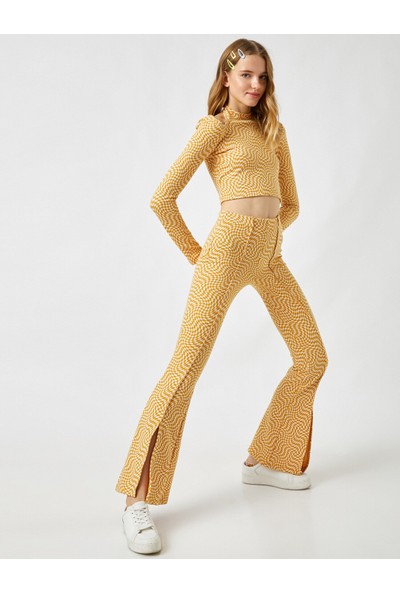 Koton Desenli Paçası Yırtmaçlı İspanyol Paça Pantolon