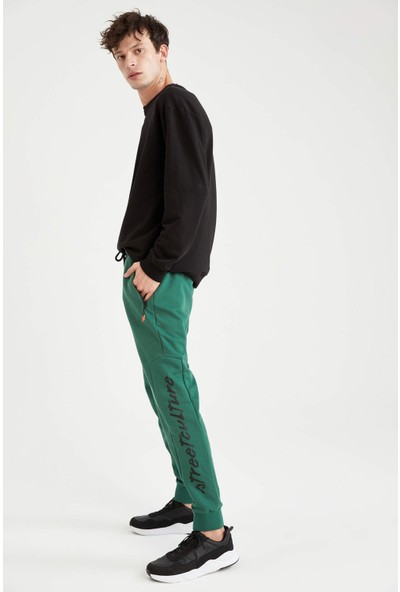 DeFacto Slim Fit Baskılı İçi Yumuşak Tüylü Jogger Eşofman Altı V1246AZ21AU DeFacto Slim Fit Baskılı İçi Yumuşak Tüylü Jogger Eşofman Altı V1246AZ21AU