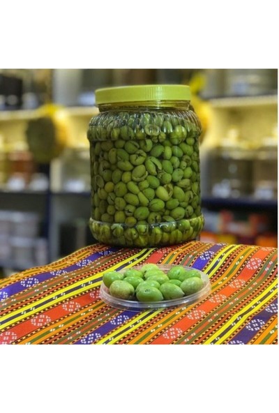 Temel Gıda Tatlandırılmış Ev Yapımı Çekirdeksiz Yeşil Zeytin 1 kg Temel Gıda Tatlandırılmış Ev Yapımı Çekirdeksiz Yeşil Zeytin 1 kg