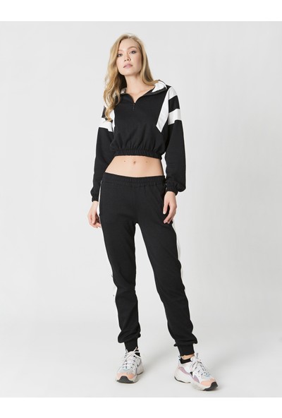 Teburada Parçalı Bayan Eşofman Takımı