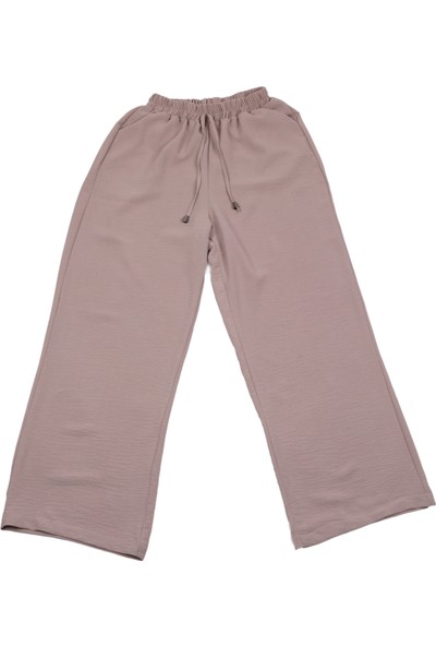 Ekle Sepete Bej Palazzo Tiril Kumaş Beli Lastikli Geniş Paça Kemerli Yazlık Kadın Pantolon Ekle Sepete Bej Palazzo Tiril Kumaş Beli Lastikli Geniş Paça Kemerli Yazlık Kadın Pantolon