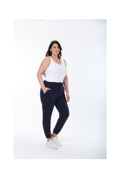 Butik Şımarık Kadın Lacivert Renk Beli Lastikli Cepli Büyük Beden Eşofman Altı Pamuklu Kumaş Butik Şımarık Kadın Lacivert Renk Beli Lastikli Cepli Büyük Beden Eşofman Altı Pamuklu Kumaş