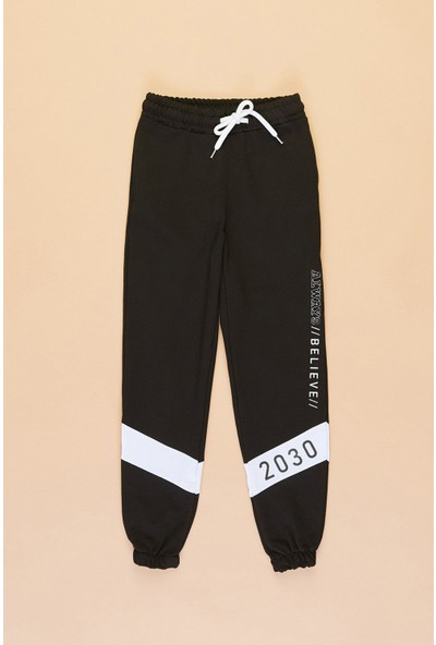 FullaModa Yazı Baskılı Paçası Lastikli Çocuk Jogger Eşofman Altı FullaModa Yazı Baskılı Paçası Lastikli Çocuk Jogger Eşofman Altı