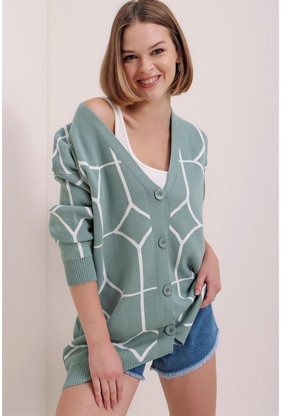 Kaftan Giyim Kadın Çağla Yeşili Çizgi Detay Yumuşak Dokulu Oversize Triko Hırka Kaftan Giyim Kadın Çağla Yeşili Çizgi Detay Yumuşak Dokulu Oversize Triko Hırka
