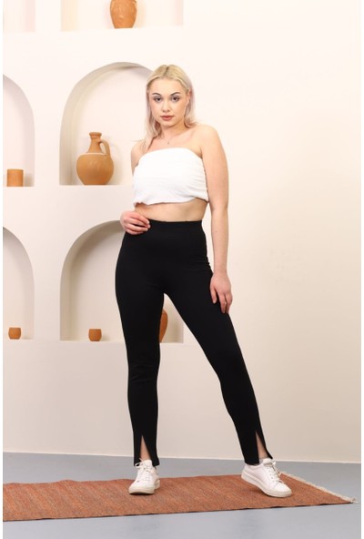 Luccassi Collection Siyah Yüksek Bel Önü Yırtmaçlı Toparlayıcı Çelik Örme Pantolon Tayt Luccassi Collection Siyah Yüksek Bel Önü Yırtmaçlı Toparlayıcı Çelik Örme Pantolon Tayt