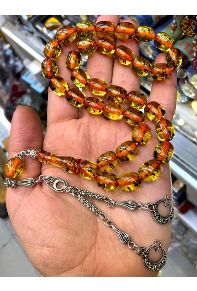 Tesbihkenti Çay Fosili Güzel Çekimli Iri Taneli Toz Kehribar Tesbih Tesbihkenti Çay Fosili Güzel Çekimli Iri Taneli Toz Kehribar Tesbih