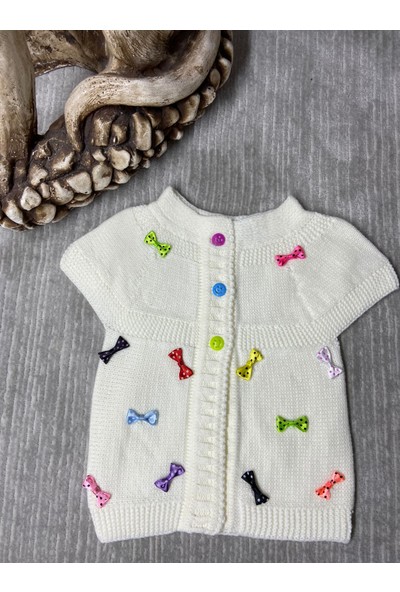 Meriç Bebe Fiyonk Detaylı Kız Çocuk Triko Yelek Meriç Bebe Fiyonk Detaylı Kız Çocuk Triko Yelek