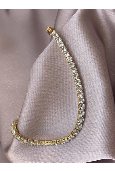 Quella Taki Çelik Zirkon Taş Gold Su Yolu Bileklik Quella Taki Çelik Zirkon Taş Gold Su Yolu Bileklik