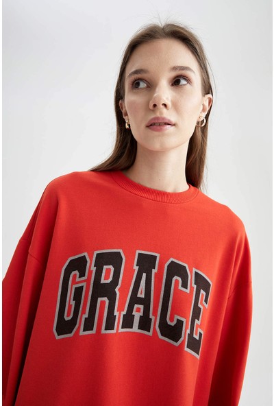 DeFacto Oversize Fit Slogan Baskılı Bisiklet Yaka İnce Sweatshirt Kumaşı Sweatshirt Tunik X1564AZ22SP DeFacto Oversize Fit Slogan Baskılı Bisiklet Yaka İnce Sweatshirt Kumaşı Sweatshirt Tunik X1564AZ22SP