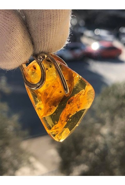 Hasyılmaz Doğal Kaya Damla Kehribar Kolye Ucu Gümüş Aparatlı 6,85 Gram Hasyılmaz Doğal Kaya Damla Kehribar Kolye Ucu Gümüş Aparatlı 6,85 Gram