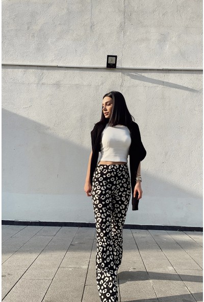 İksora Kadın Siyah Beyaz Leopar Desen Ispanyol Paça Likralı Örme Pantolon