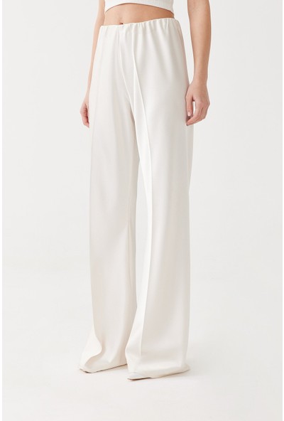 Suud Collection Ekru Beli Lastikli Bol Kesim Saten Pantolon Suud Collection Ekru Beli Lastikli Bol Kesim Saten Pantolon