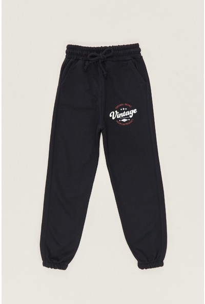 FullaModa Vintage Baskılı Paçası Lastikli Çocuk Jogger Eşofman Altı FullaModa Vintage Baskılı Paçası Lastikli Çocuk Jogger Eşofman Altı