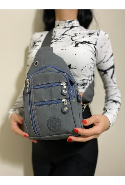 Mekkan Moda Unisex Gri Renk Fermuarlı Çapraz Göğüs ve Sırt Çantası Mekkan Moda Unisex Gri Renk Fermuarlı Çapraz Göğüs ve Sırt Çantası