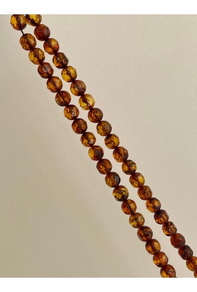 Faset Kesim Doğal Kaya Damla Kehribar Tesbih 66LIK 7,5mm 18,72 Gram Faset Kesim Doğal Kaya Damla Kehribar Tesbih 66LIK 7,5mm 18,72 Gram