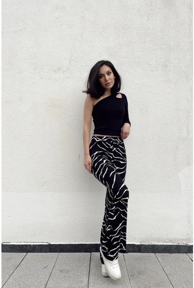 İksora Kadın Siyah Mermer Desenli Ispanyol Paça Likralı Örme Pantolon İksora Kadın Siyah Mermer Desenli Ispanyol Paça Likralı Örme Pantolon