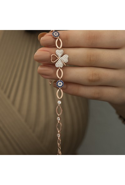 Enes Gümüş Yonca ve Nazar Modelli 925 Ayar Gümüş Bayan Bileklik Enes Gümüş Yonca ve Nazar Modelli 925 Ayar Gümüş Bayan Bileklik