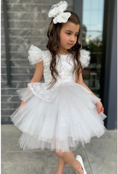 Riccotarz Kız Çocuk Omzu Tütülü ve Sim Işlemeli Kabarık Beyaz Abiye Riccotarz Kız Çocuk Omzu Tütülü ve Sim Işlemeli Kabarık Beyaz Abiye