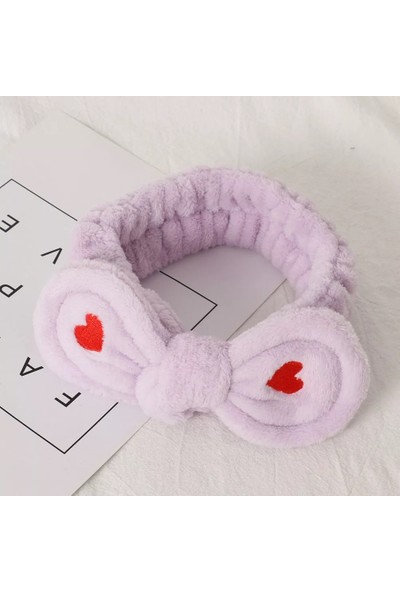 Courtesy Mor Kalp Detaylı Fiyonklu Peluş Spa Saç Bandı Courtesy Mor Kalp Detaylı Fiyonklu Peluş Spa Saç Bandı