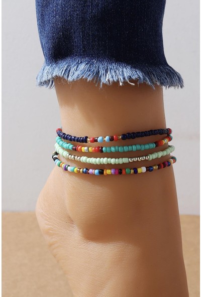 New Obsessions 4'lü Renkli Boncuk Cipsino Halhal Seti New Obsessions 4'lü Renkli Boncuk Cipsino Halhal Seti