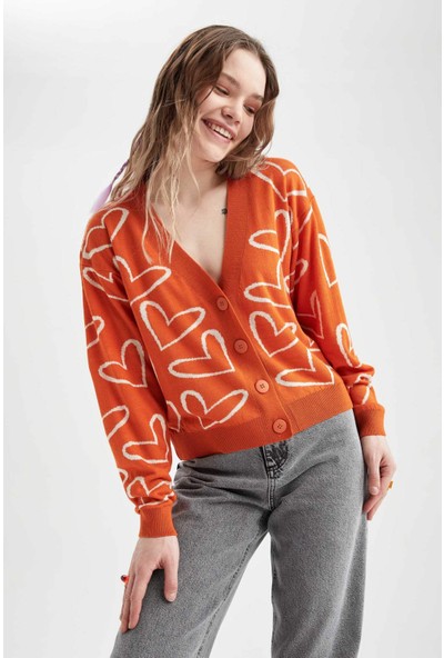 DeFacto Coool Oversize Fit Zebra Desenli V Yaka Düğmeli Triko Hırka X0094AZ22SP DeFacto Coool Oversize Fit Zebra Desenli V Yaka Düğmeli Triko Hırka X0094AZ22SP