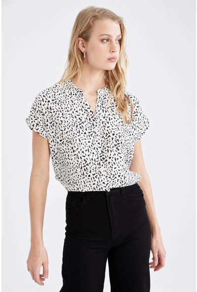 DeFacto Regular Fit Leopar Desenli Kısa Kollu Gömlek I6173AZ22SM DeFacto Regular Fit Leopar Desenli Kısa Kollu Gömlek I6173AZ22SM