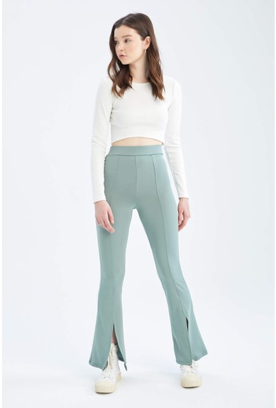 DeFacto Yüksek Bel Yırtmaç Detaylı İspanyol Paça Tayt Pantolon Y5937AZ22SM DeFacto Yüksek Bel Yırtmaç Detaylı İspanyol Paça Tayt Pantolon Y5937AZ22SM