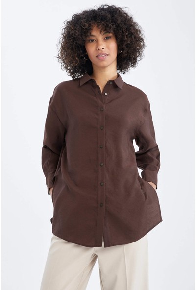 DeFacto Oversize Fit Yırtmaç Detaylı Tensel Uzun Kollu Gömlek Tunik X0776AZ22SM DeFacto Oversize Fit Yırtmaç Detaylı Tensel Uzun Kollu Gömlek Tunik X0776AZ22SM