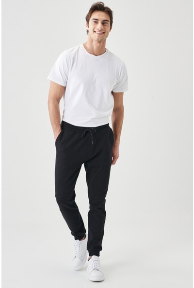 AC&Co / Altınyıldız Classics Erkek Siyah Standart Fit Beli ve Paçası Lastikli Rahat Spor Eşofman Altı AC&Co / Altınyıldız Classics Erkek Siyah Standart Fit Beli ve Paçası Lastikli Rahat Spor Eşofman Altı