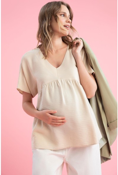 DeFacto Regular Fit Dokuma Volanlı Kisa Kollu Hamile Bluz X7296AZ22SM DeFacto Regular Fit Dokuma Volanlı Kisa Kollu Hamile Bluz X7296AZ22SM