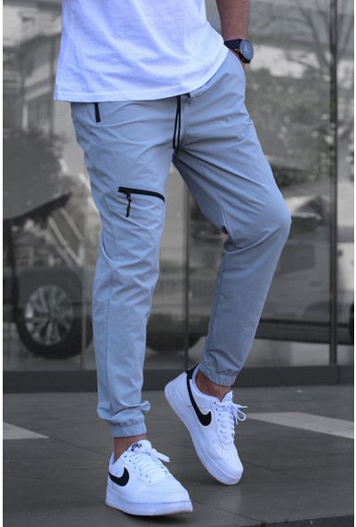 Madmext Boyalı Gri Fermuar Detaylı Paraşüt Jogger Pantolon Madmext Boyalı Gri Fermuar Detaylı Paraşüt Jogger Pantolon