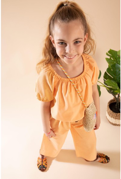 DeFacto Kız Çocuk Relax Fit Kısa Kollu Bluz Geniş Paça Pantolon Keten Görünümlü Takım X3235A622SM DeFacto Kız Çocuk Relax Fit Kısa Kollu Bluz Geniş Paça Pantolon Keten Görünümlü Takım X3235A622SM