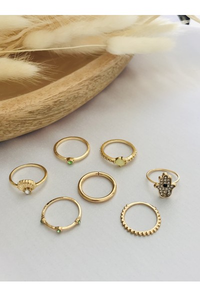 Mercan Aksesuar Gold Renk 7 Adet Taşlı Çoklu Yüzük Seti Mercan Aksesuar Gold Renk 7 Adet Taşlı Çoklu Yüzük Seti