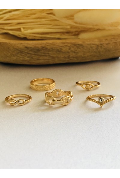 Mercan Aksesuar Gold Renk 5 Adet Çoklu Yüzük Seti Mercan Aksesuar Gold Renk 5 Adet Çoklu Yüzük Seti