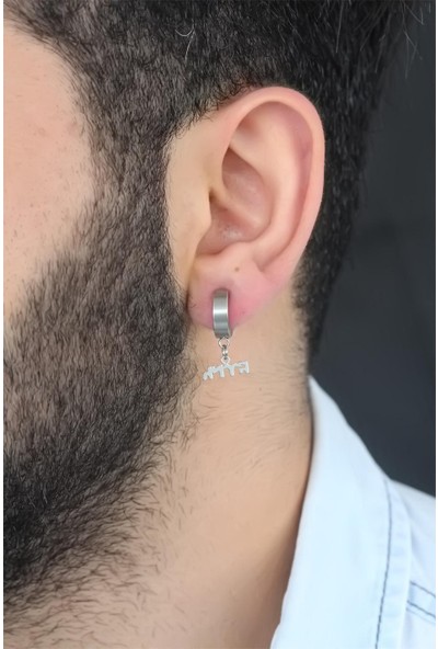Silver Renk Kaplama Göktürkçe Yazı Figürlü Çelik Kıstırmalı Erkek Küpe Silver Renk Kaplama Göktürkçe Yazı Figürlü Çelik Kıstırmalı Erkek Küpe