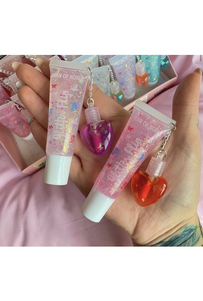Zetmoda Kalpli 2'li Dudakparlatıcısı 2 Adet Lip Gloss Lip Balm Lip Oil Glitter Zetmoda Kalpli 2'li Dudakparlatıcısı 2 Adet Lip Gloss Lip Balm Lip Oil Glitter