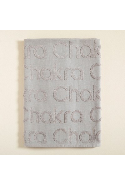 Chakra Monogram Plaj Havlusu 100 x 180 cm Sıcak Gri Chakra Monogram Plaj Havlusu 100 x 180 cm Sıcak Gri